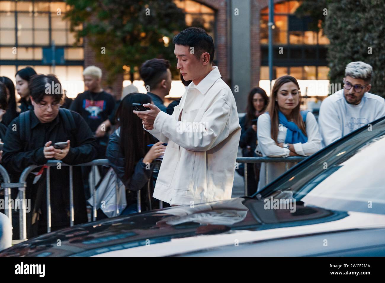 A guest outside Versace show during Milan Fashion Week Womenswear ...