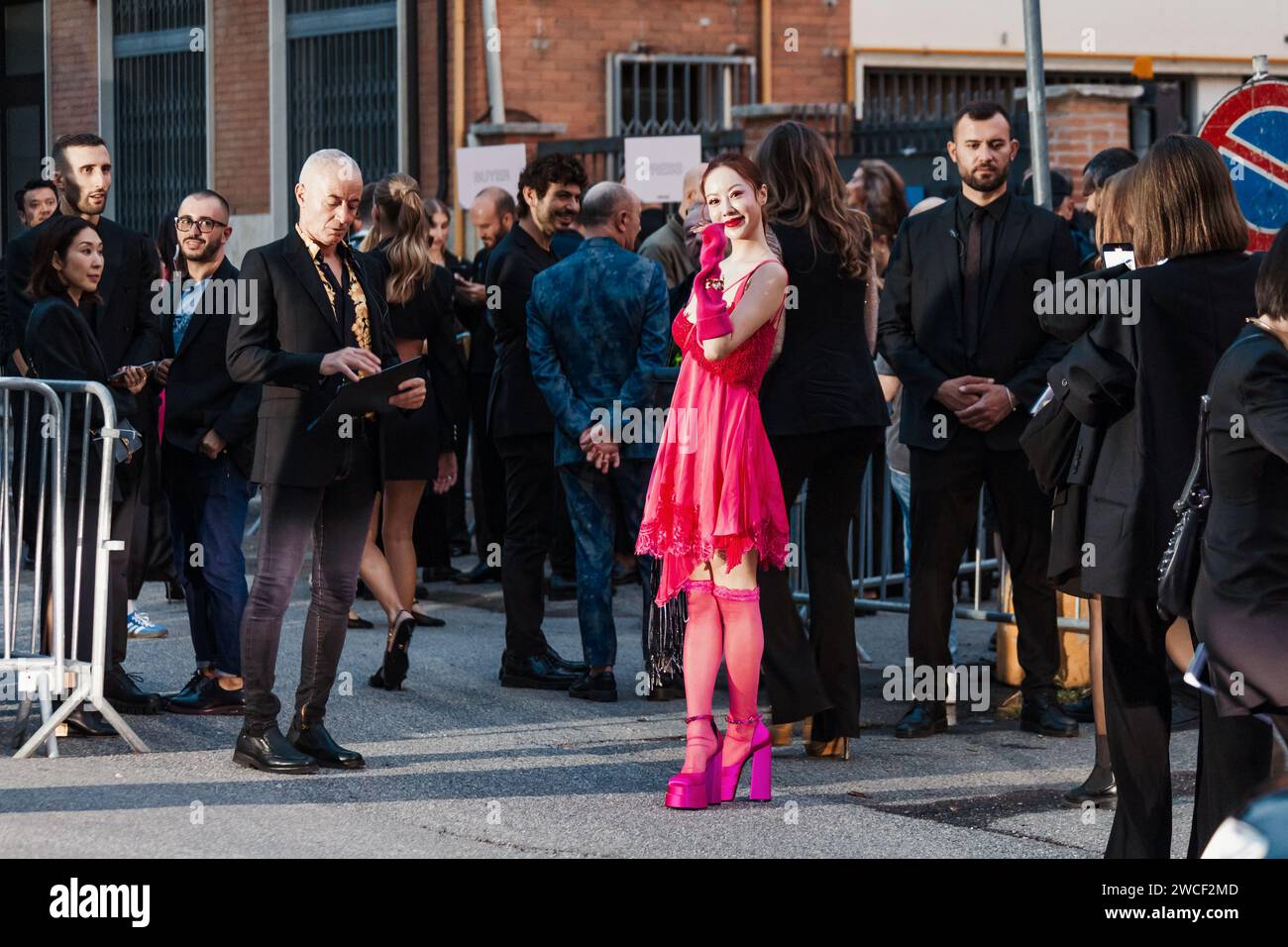 Guests outside Versace show during Milan Fashion Week Womenswear Spring ...