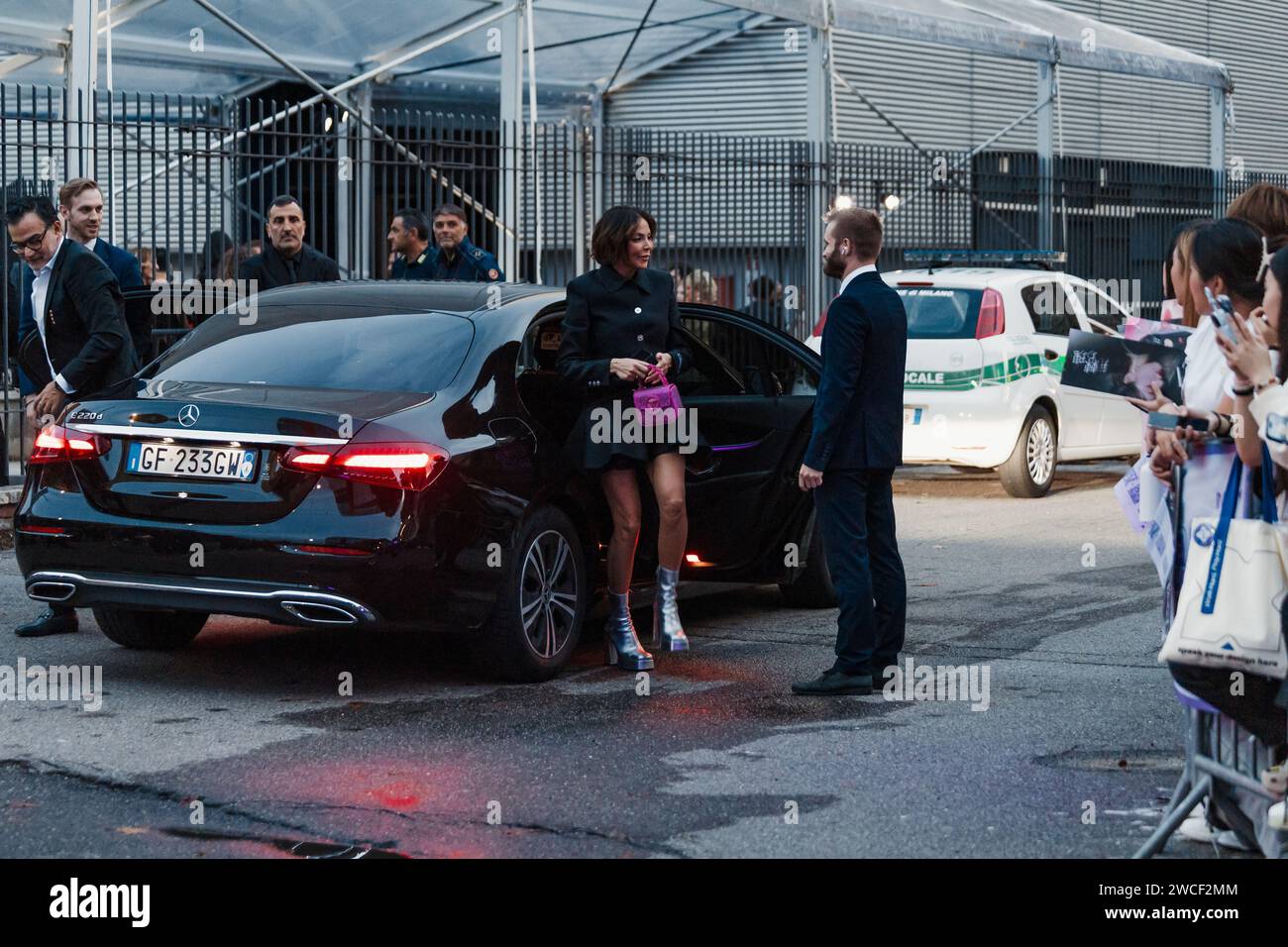 Guests outside Versace show during Milan Fashion Week Womenswear Spring ...