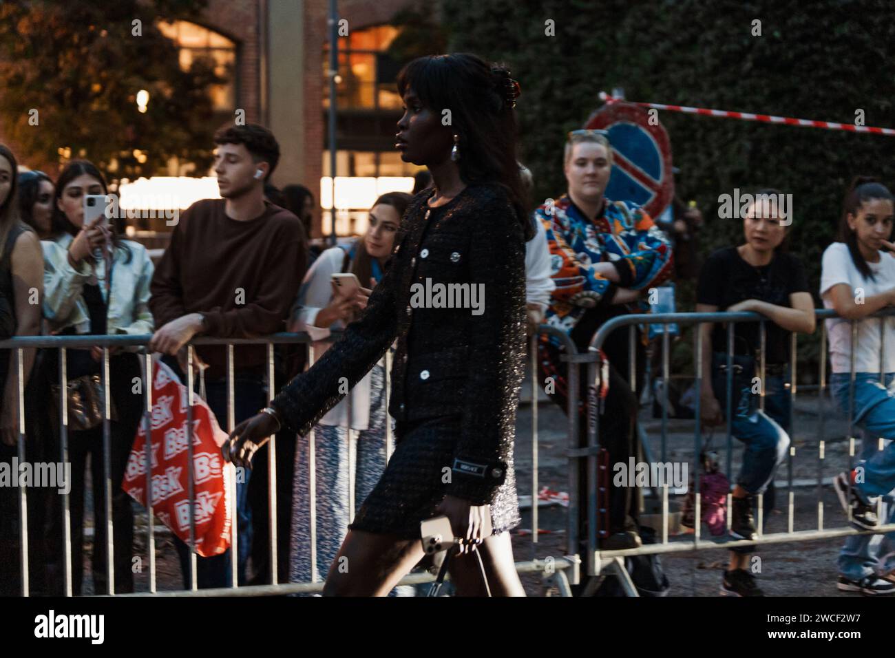 A guest outside Versace show during Milan Fashion Week Womenswear ...