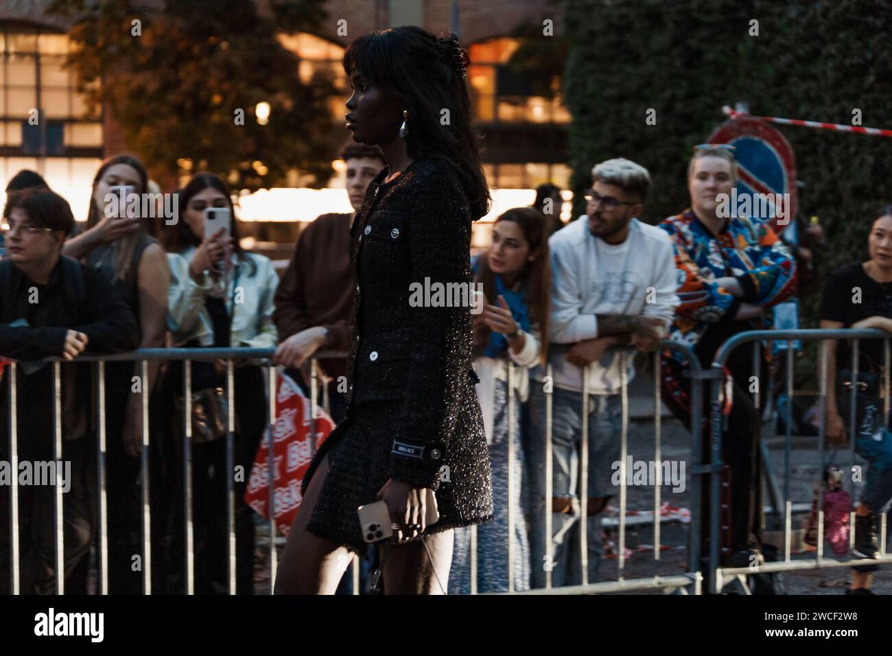 A guest outside Versace show during Milan Fashion Week Womenswear ...