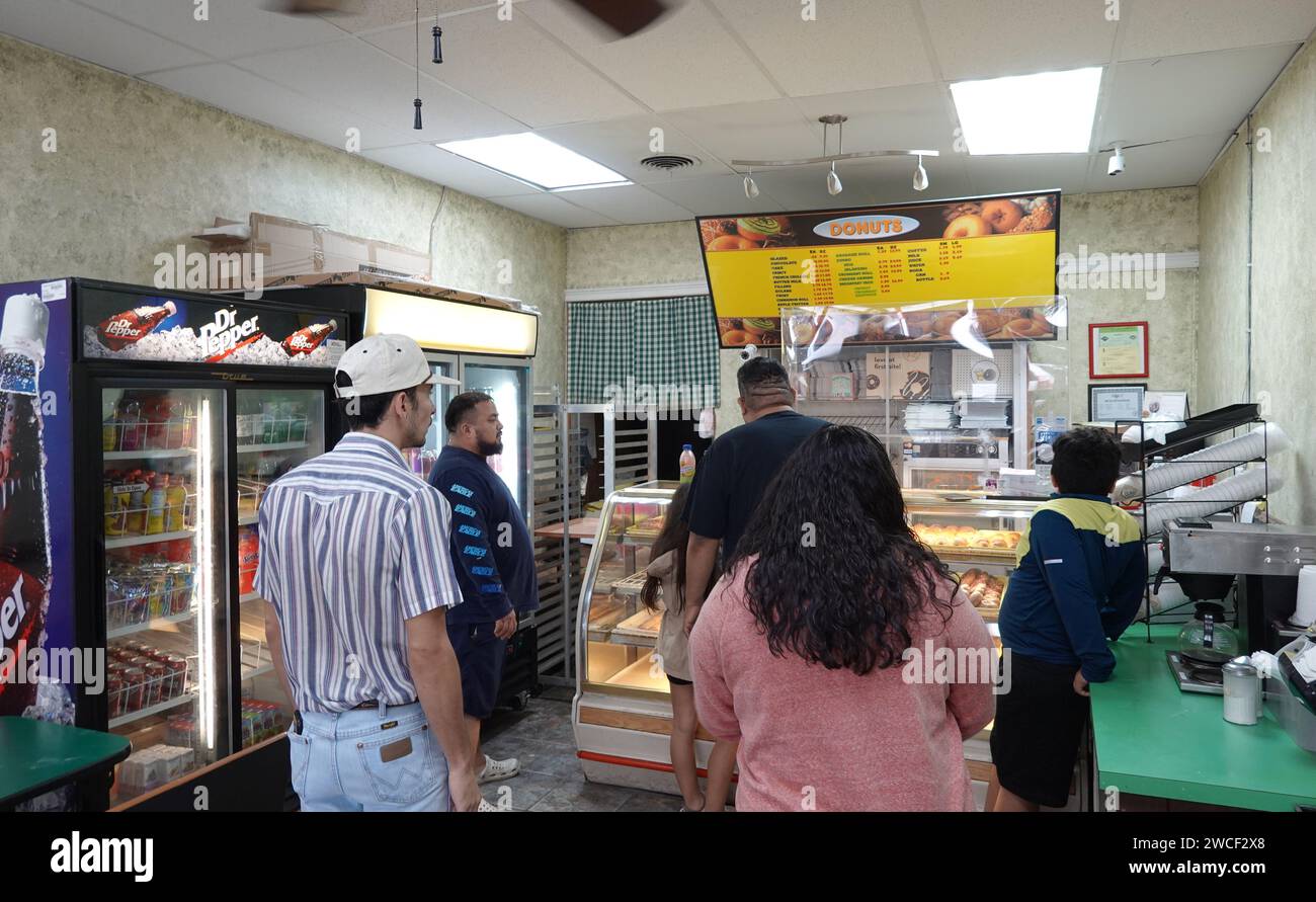 Customers waiting in line at a donut shop - November 2023 Stock Photo ...