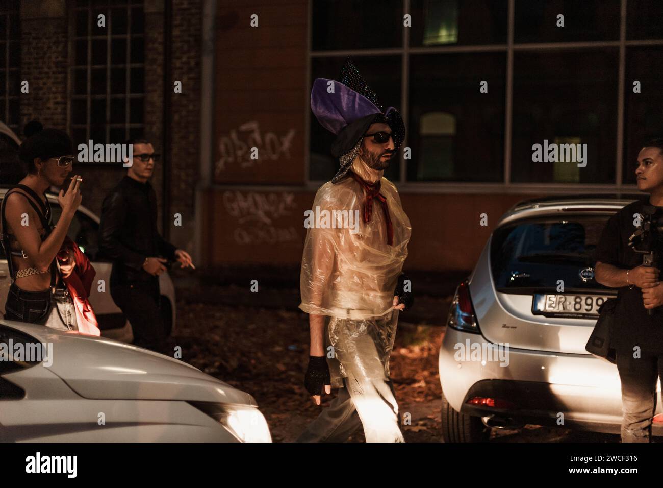 A guest outside Versace show during Milan Fashion Week Womenswear ...