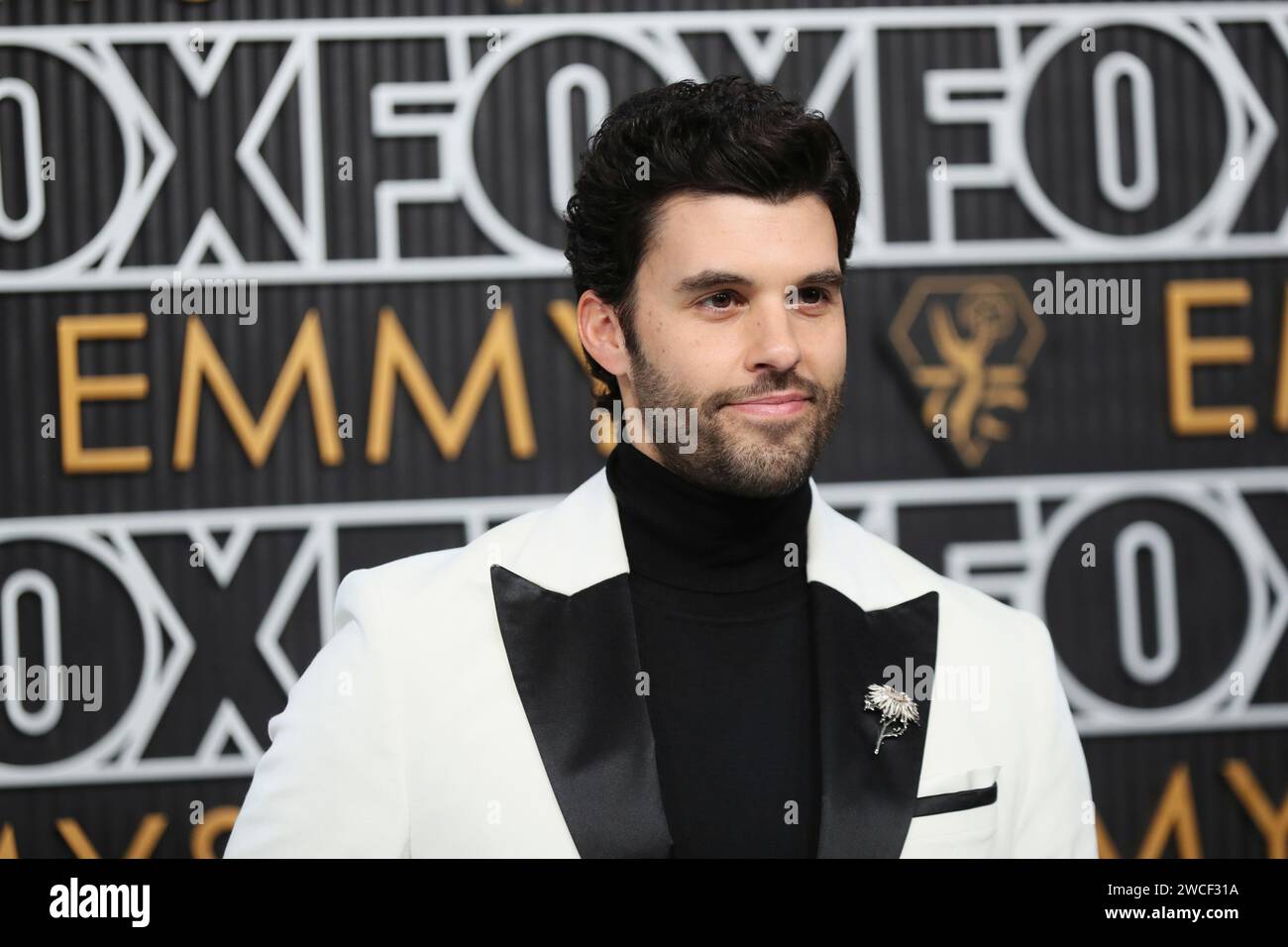 Steven Krueger poses for a Red Carpet portrait at the 75th Emmy Awards ...