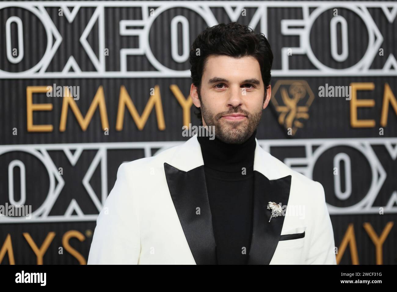 Steven Krueger poses for a Red Carpet portrait at the 75th Emmy Awards ...