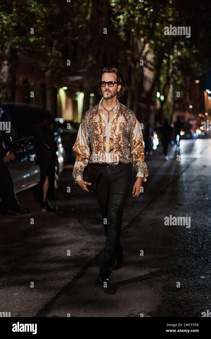 A guest outside Versace show during Milan Fashion Week Womenswear ...