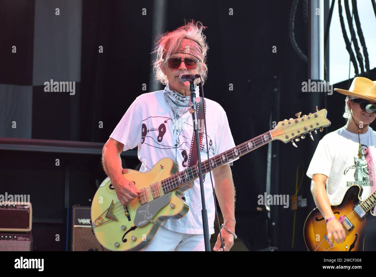 Cheap Trick performs in Sherman Texas, during what would become a rain ...