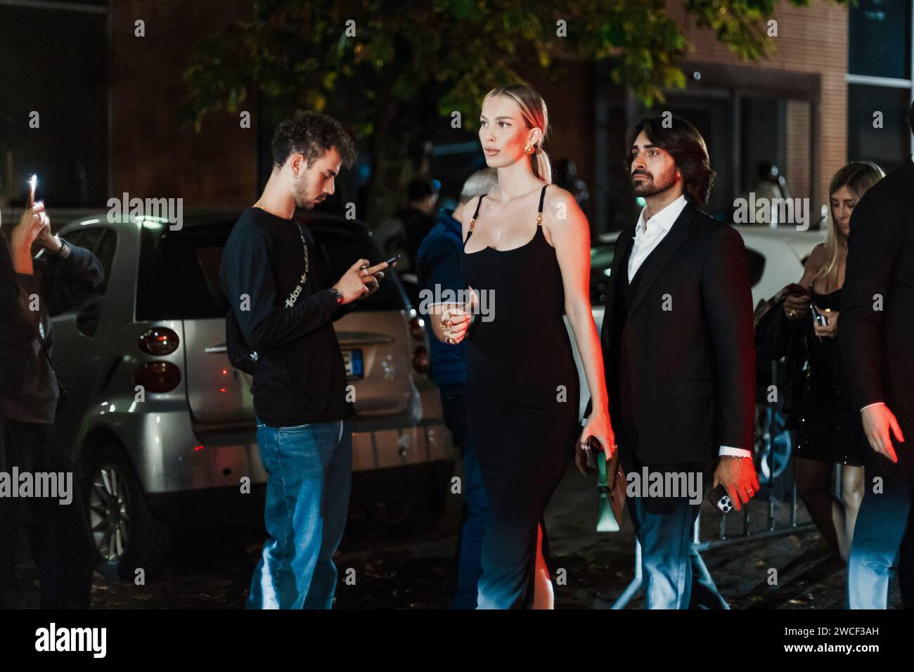 Guests outside Versace show during Milan Fashion Week Womenswear Spring ...