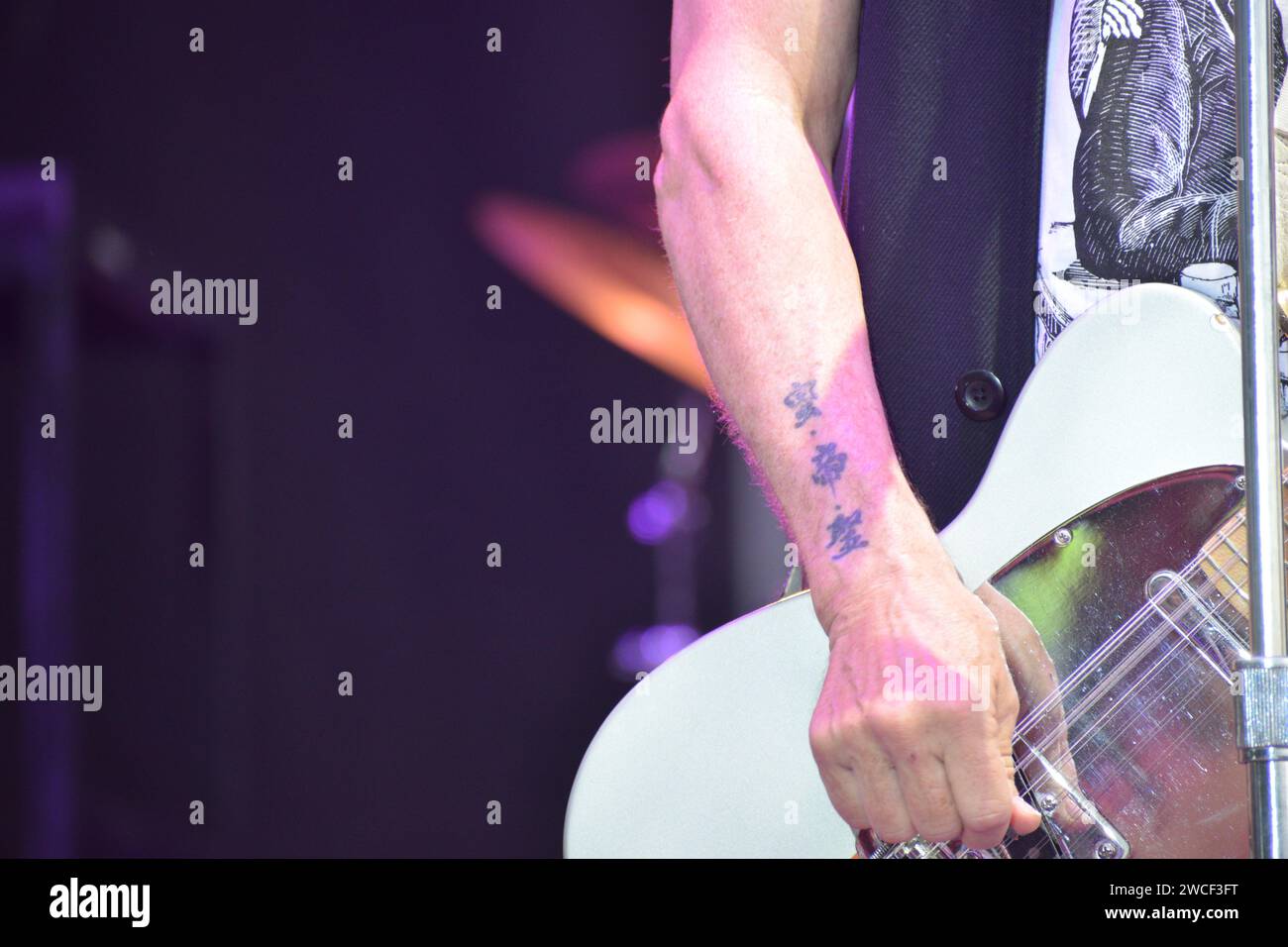 Cheap Trick performs in Sherman Texas, during what would become a rain ...