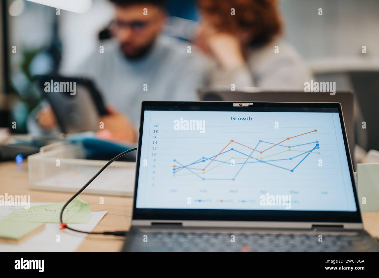 Business team reviewing statistics for marketing strategy, discussing graph charts Stock Photo ...