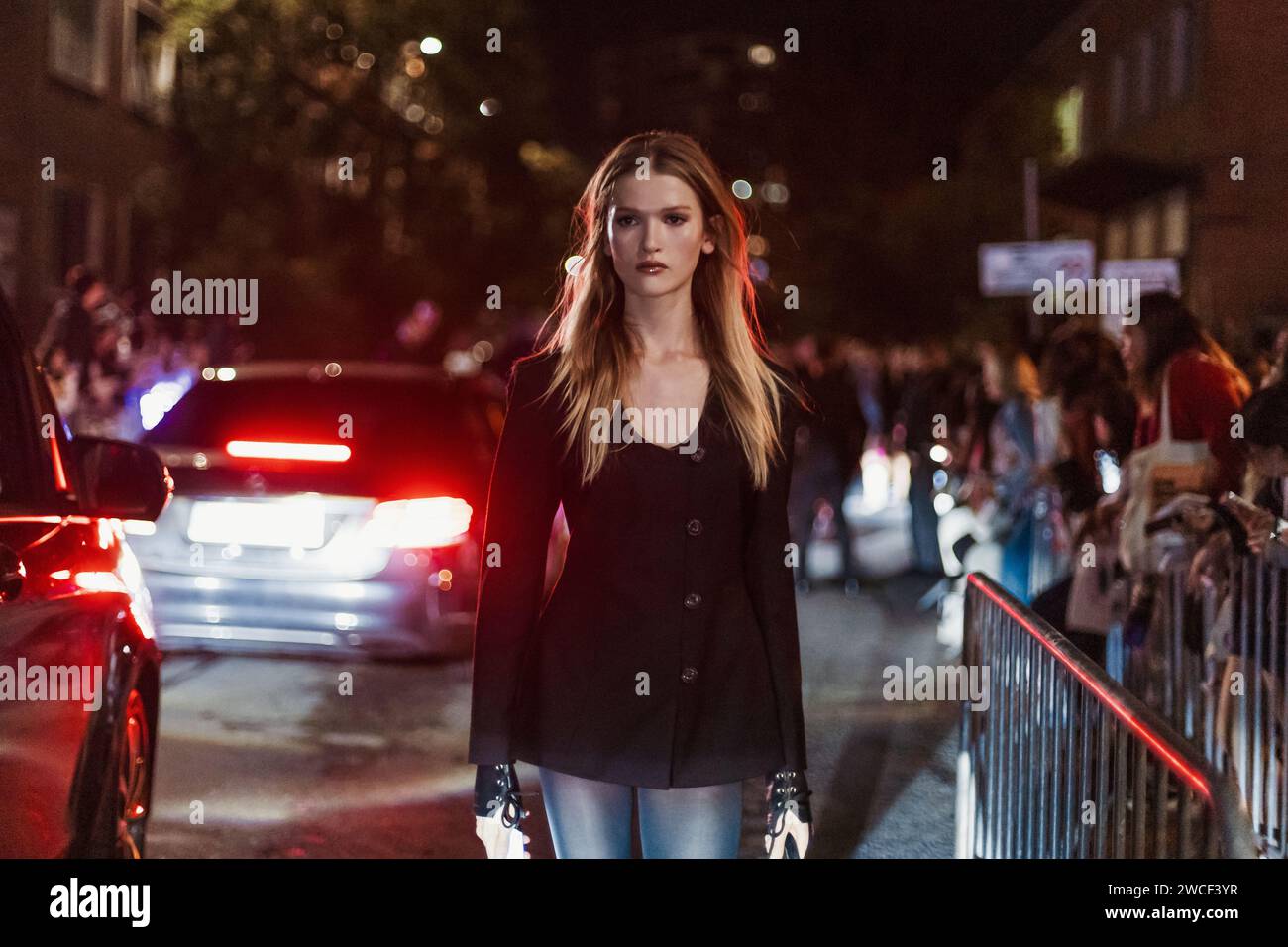 A model outside Versace show during Milan Fashion Week Womenswear ...