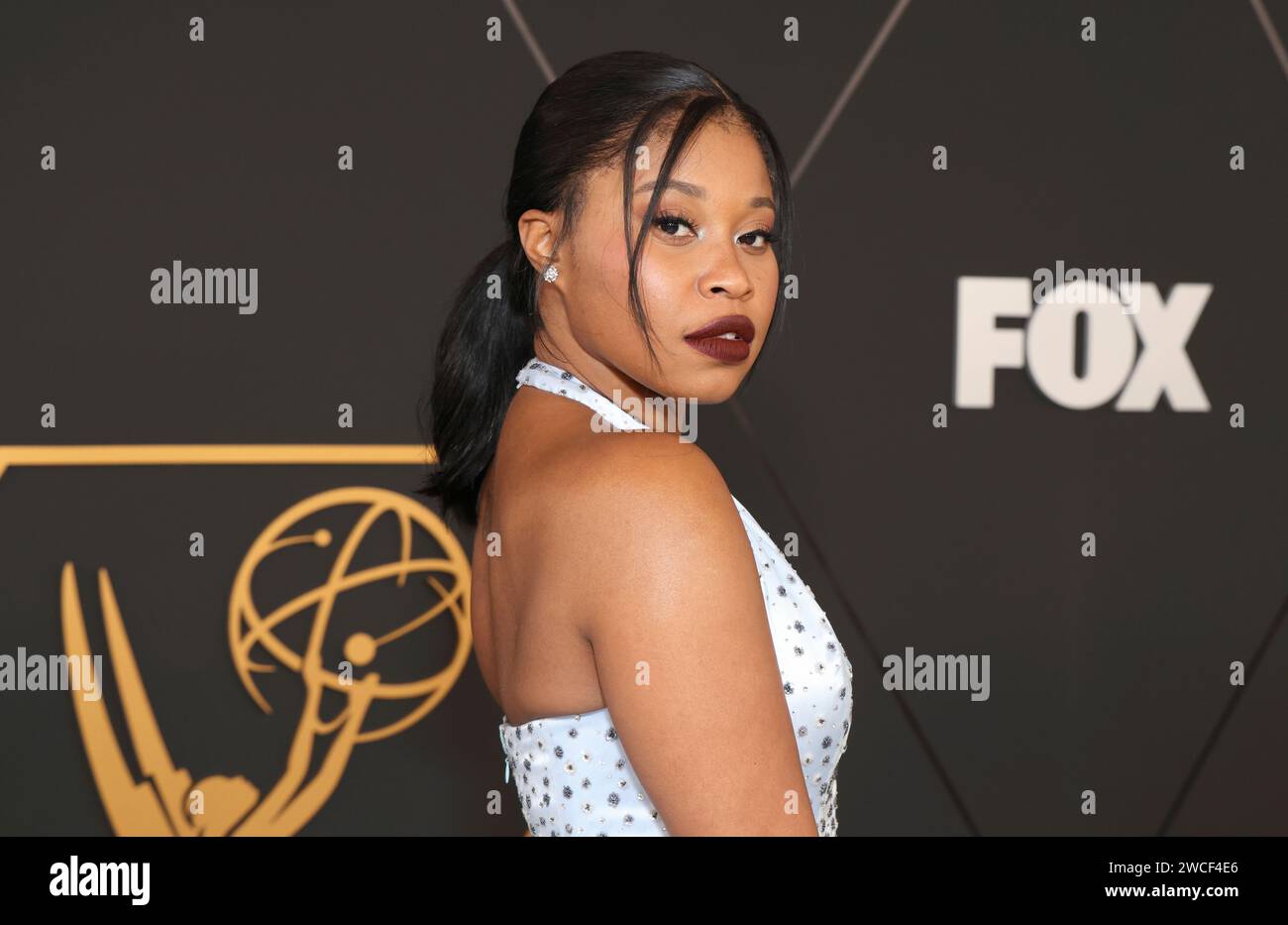 Dominique Fishback walks the red carpet at the 75th Emmy Awards on ...