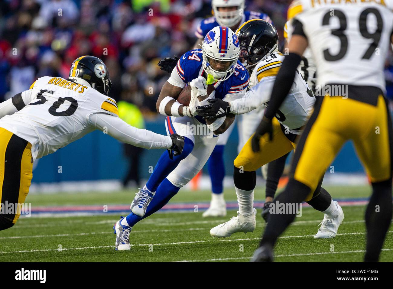Buffalo Bills wide receiver Stefon Diggs (14) runs after a catch during ...