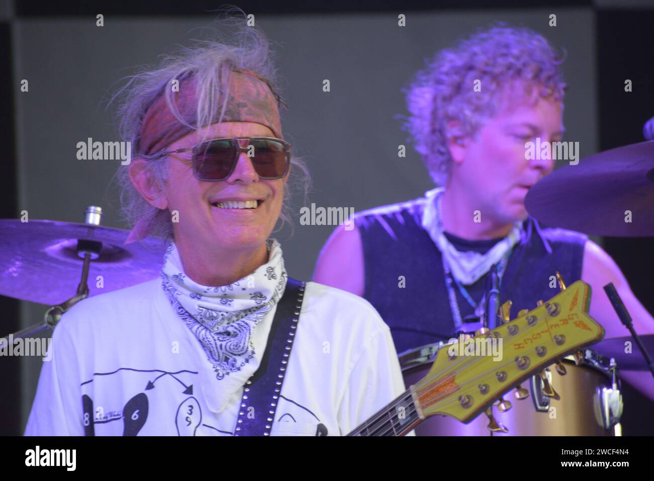 Cheap Trick performs in Sherman Texas, during what would become a rain ...