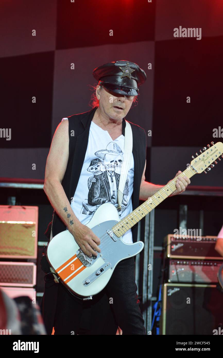 Cheap Trick performs in Sherman Texas, during what would become a rain ...