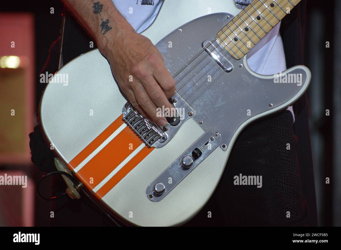 Cheap Trick performs in Sherman Texas, during what would become a rain ...