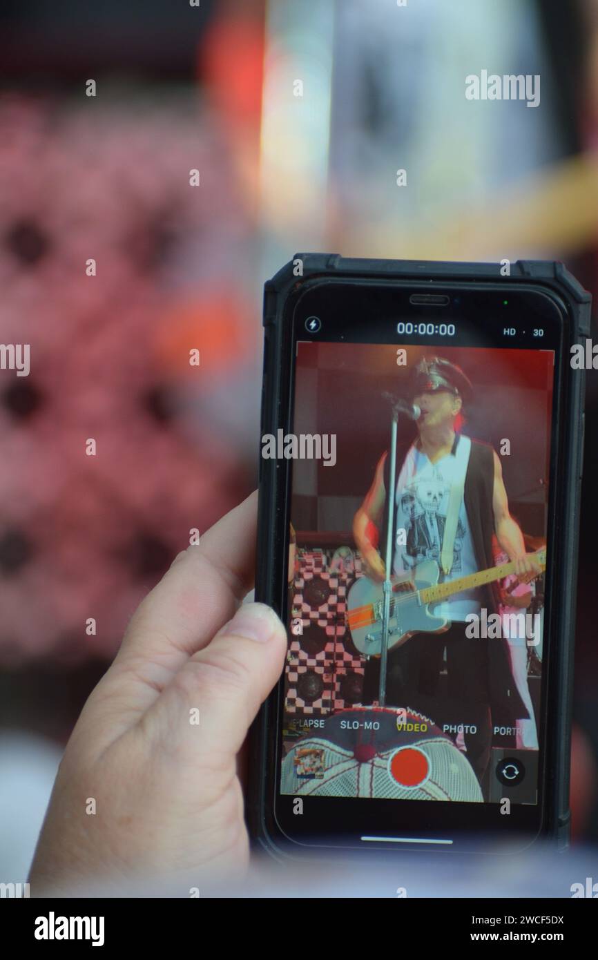 Cheap Trick performs in Sherman Texas, during what would become a rain ...