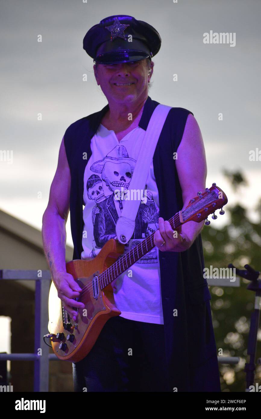 Cheap Trick performs in Sherman Texas, during what would become a rain ...