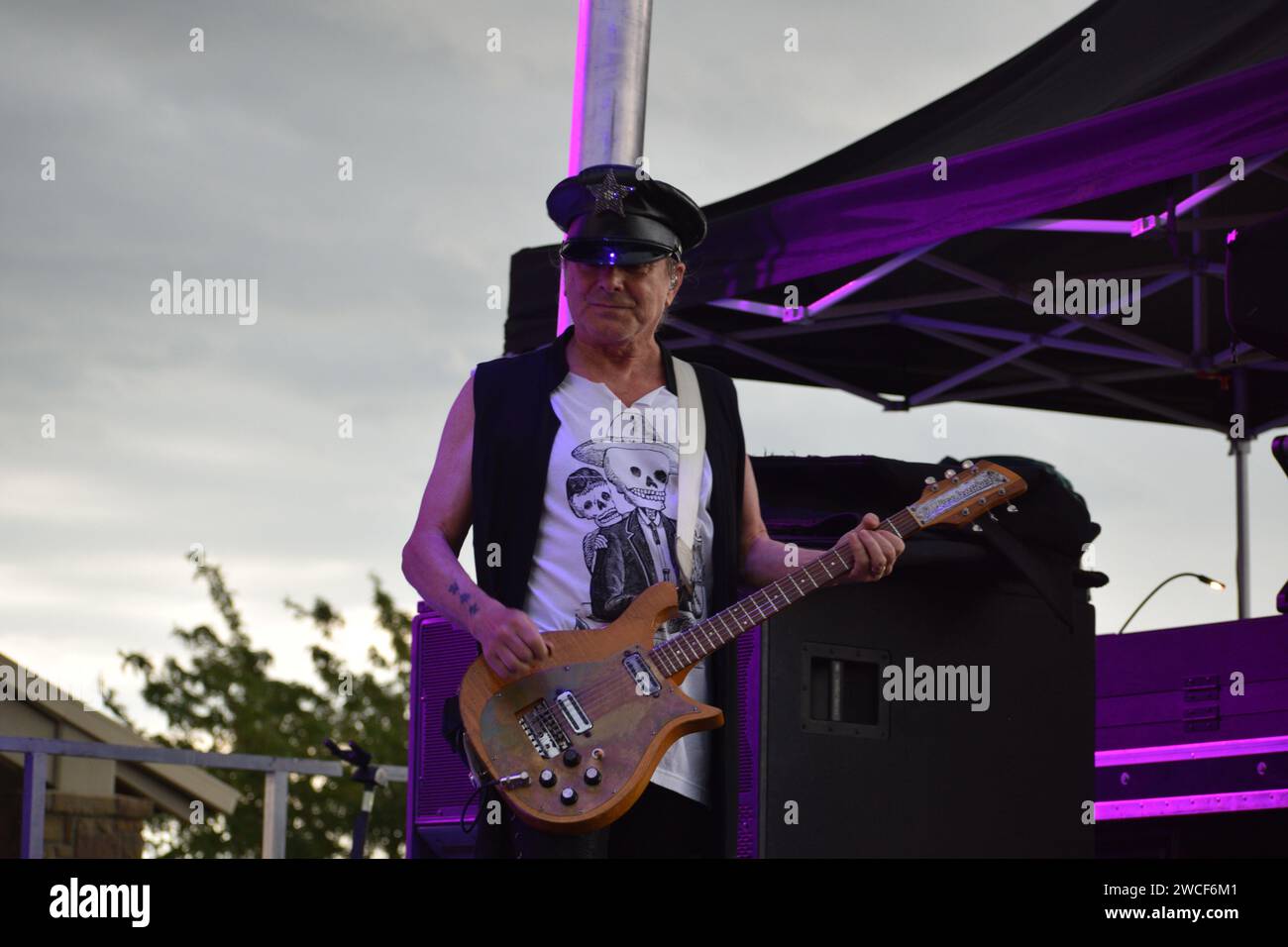 Cheap Trick performs in Sherman Texas, during what would become a rain ...