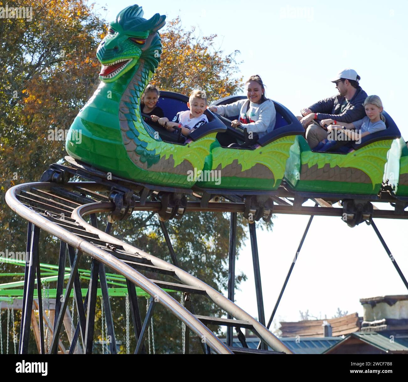 Children having fun on a roller coaster at Yesterland Farm in Canton ...