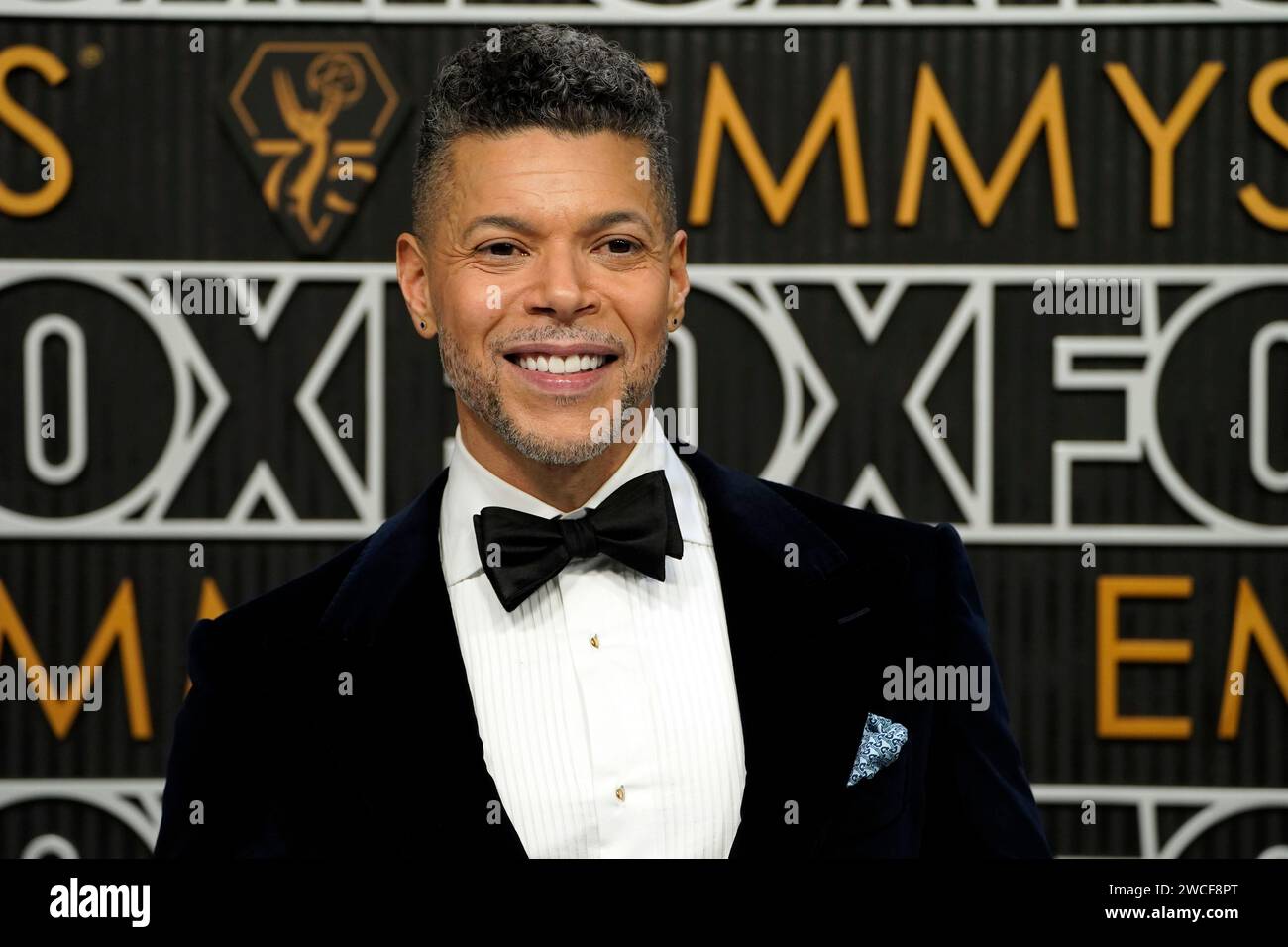 Wilson Cruz poses for a Red Carpet portrait at the 75th Emmy Awards on ...