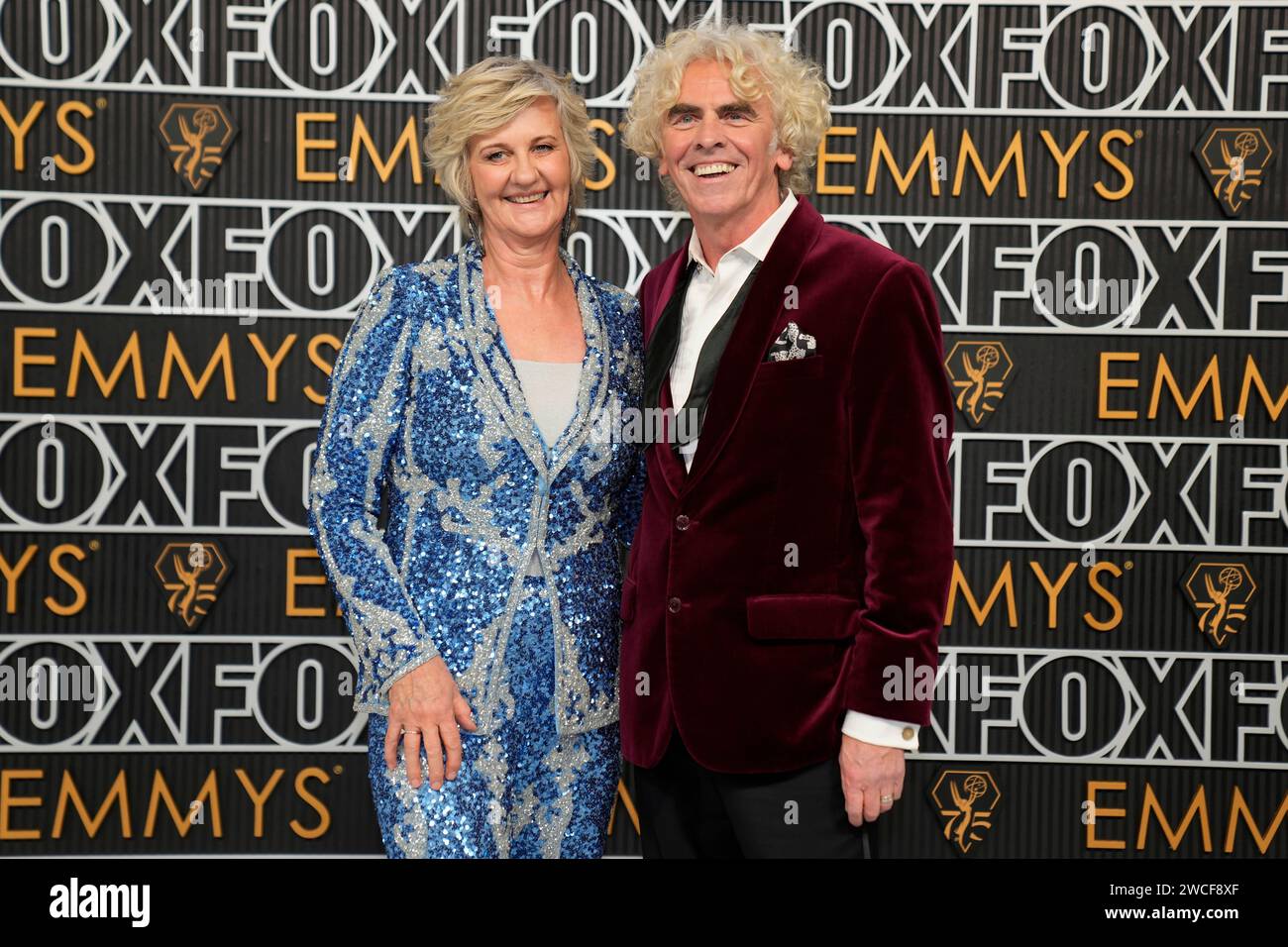 Declan Lowney, right, and Jenny Barrett arrive at the 75th Primetime ...