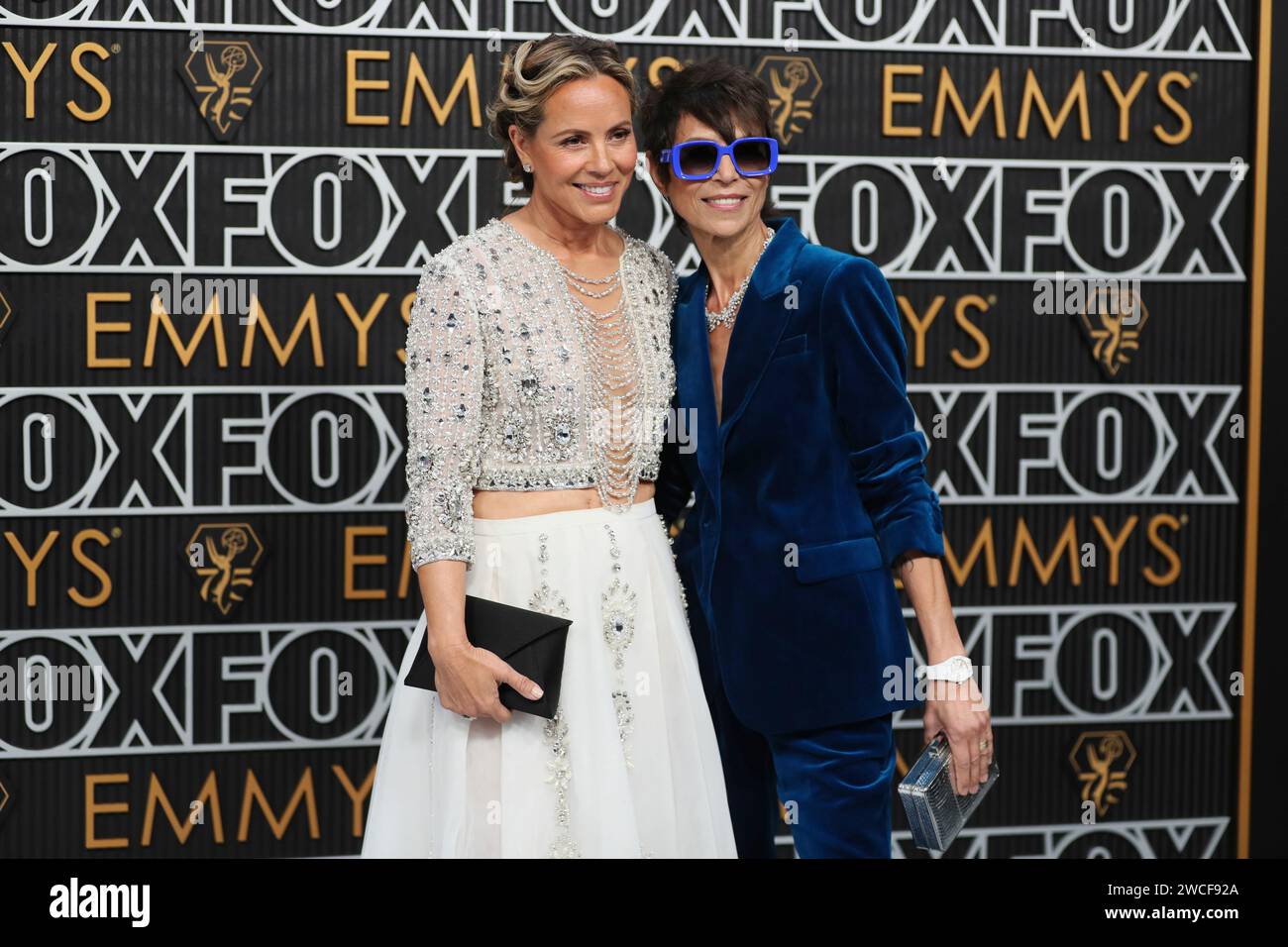 Maria Bello, left, and Dominique Crenn pose for a Red Carpet portrait ...