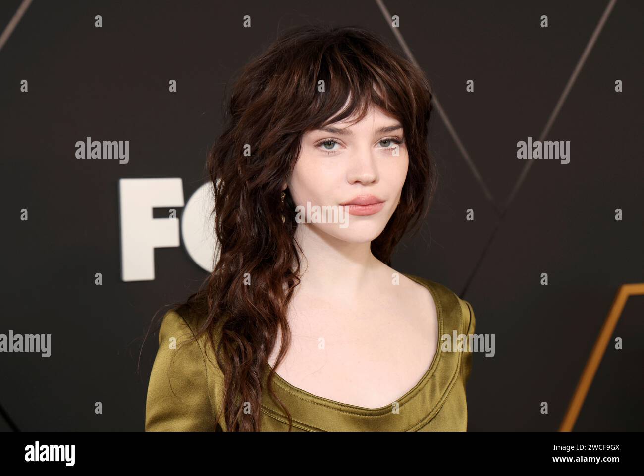 Sophie Thatcher walks the red carpet at the 75th Emmy Awards on Monday ...