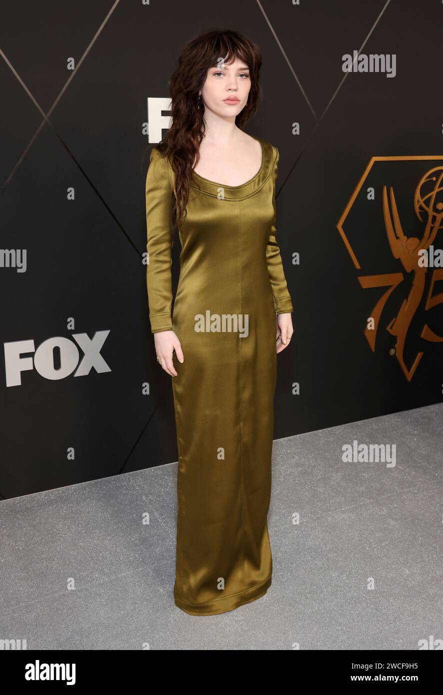 Sophie Thatcher walks the red carpet at the 75th Emmy Awards on Monday ...