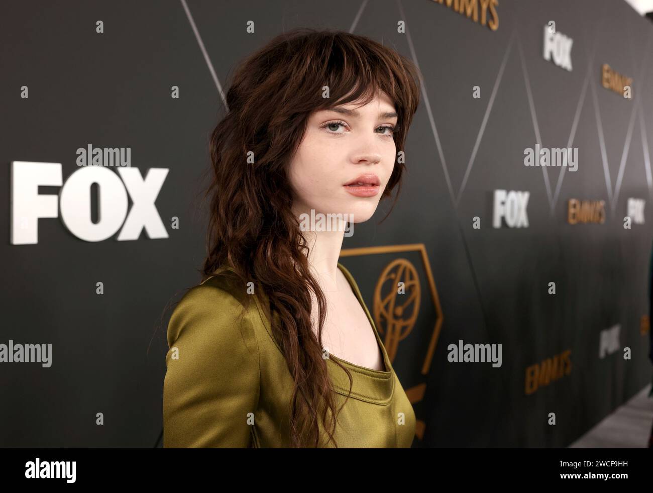 Sophie Thatcher walks the red carpet at the 75th Emmy Awards on Monday ...