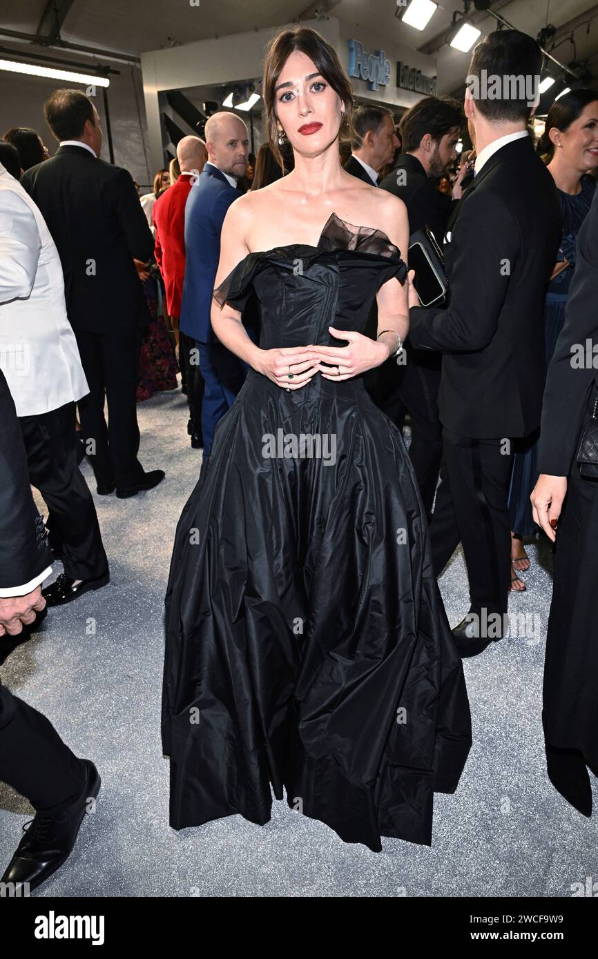 Lizzy Caplan walks the red carpet at the 75th Emmy Awards on Monday ...