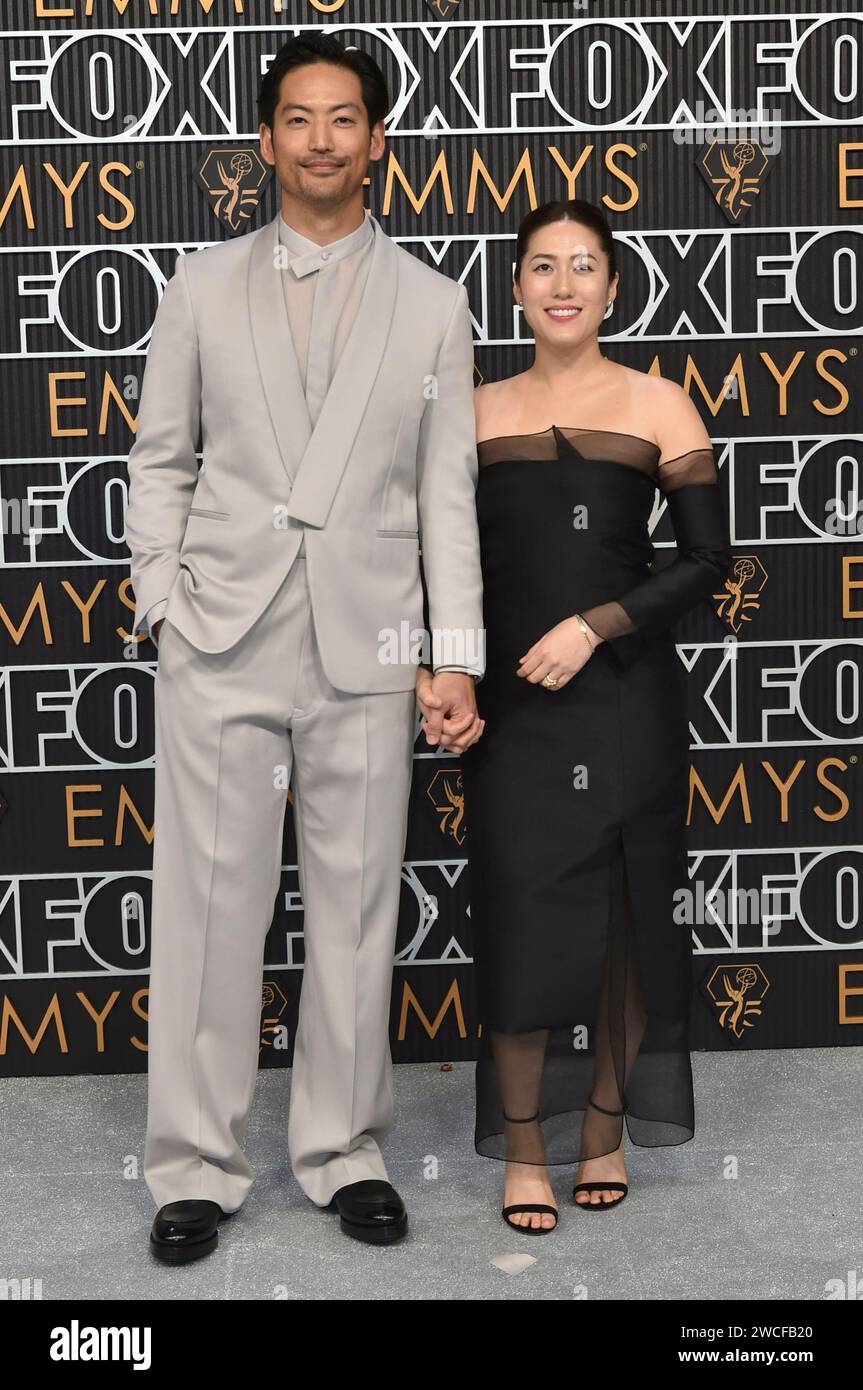 Joseph Lee, left, and Diana Ryu arrive at the 75th Primetime Emmy ...