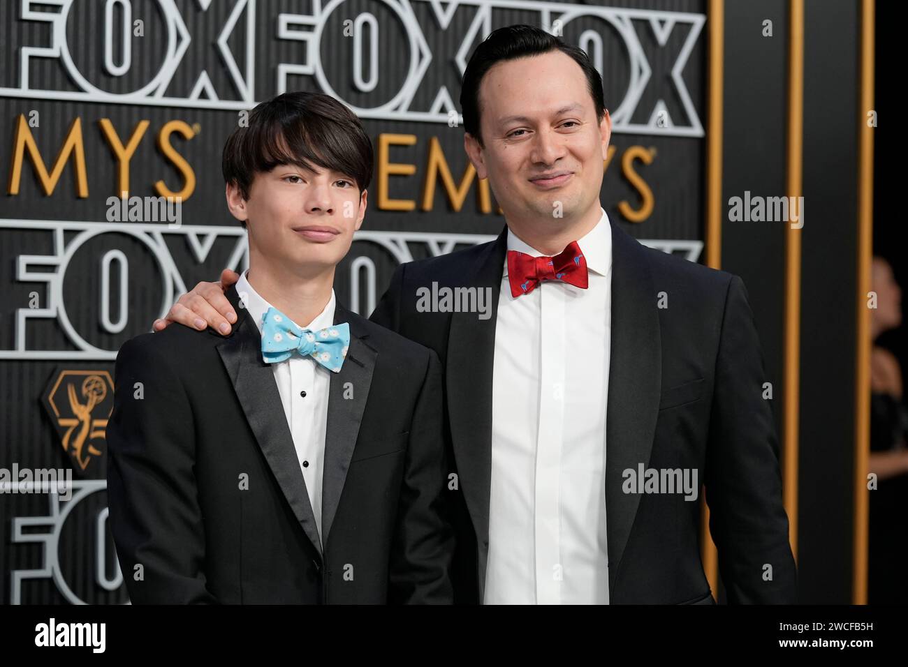 Truman Kayne, left, and Michael Cruz Kayne arrive at the 75th Primetime ...