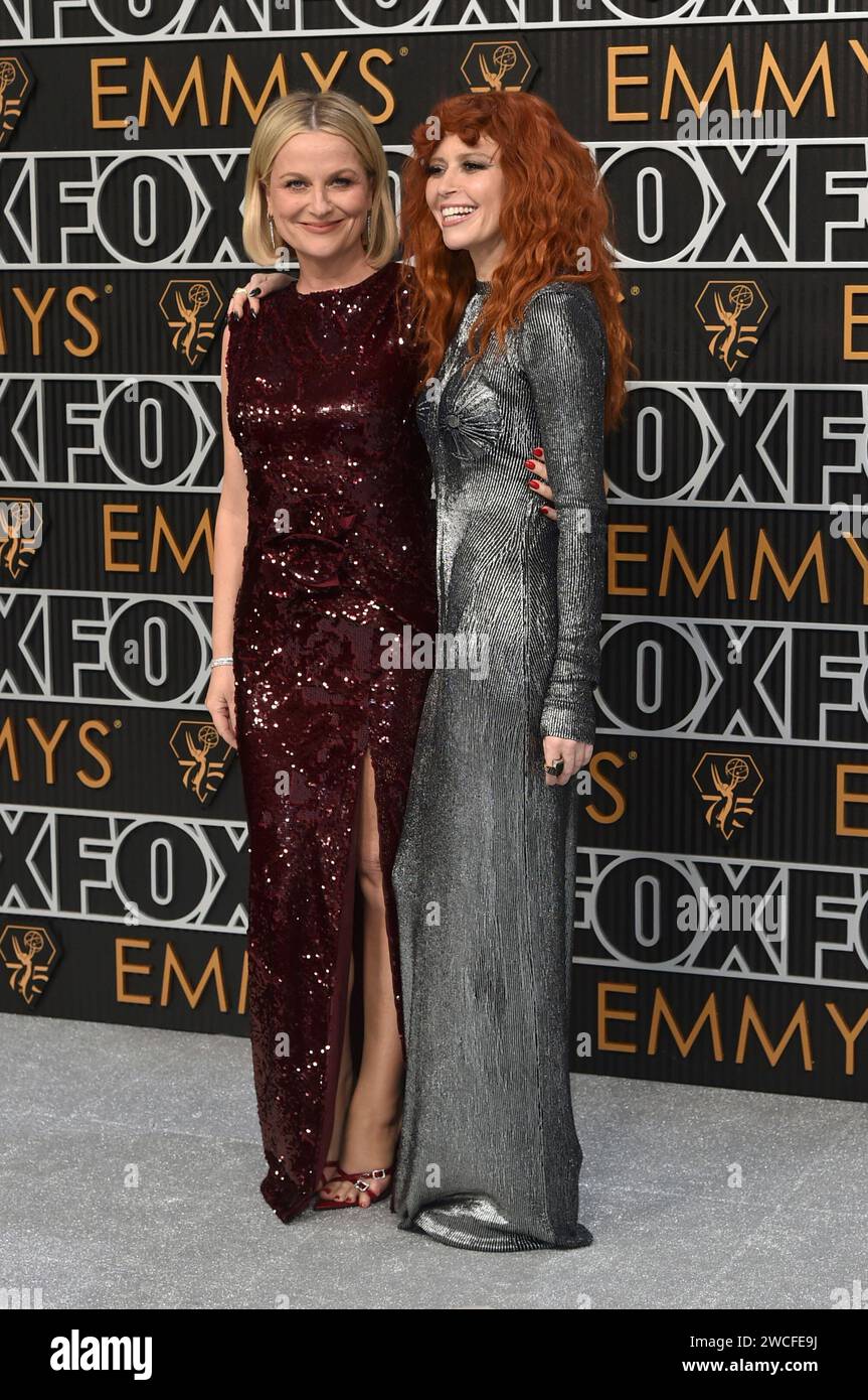 Amy Poehler, left, and Natasha Lyonne arrive at the 75th Primetime Emmy ...