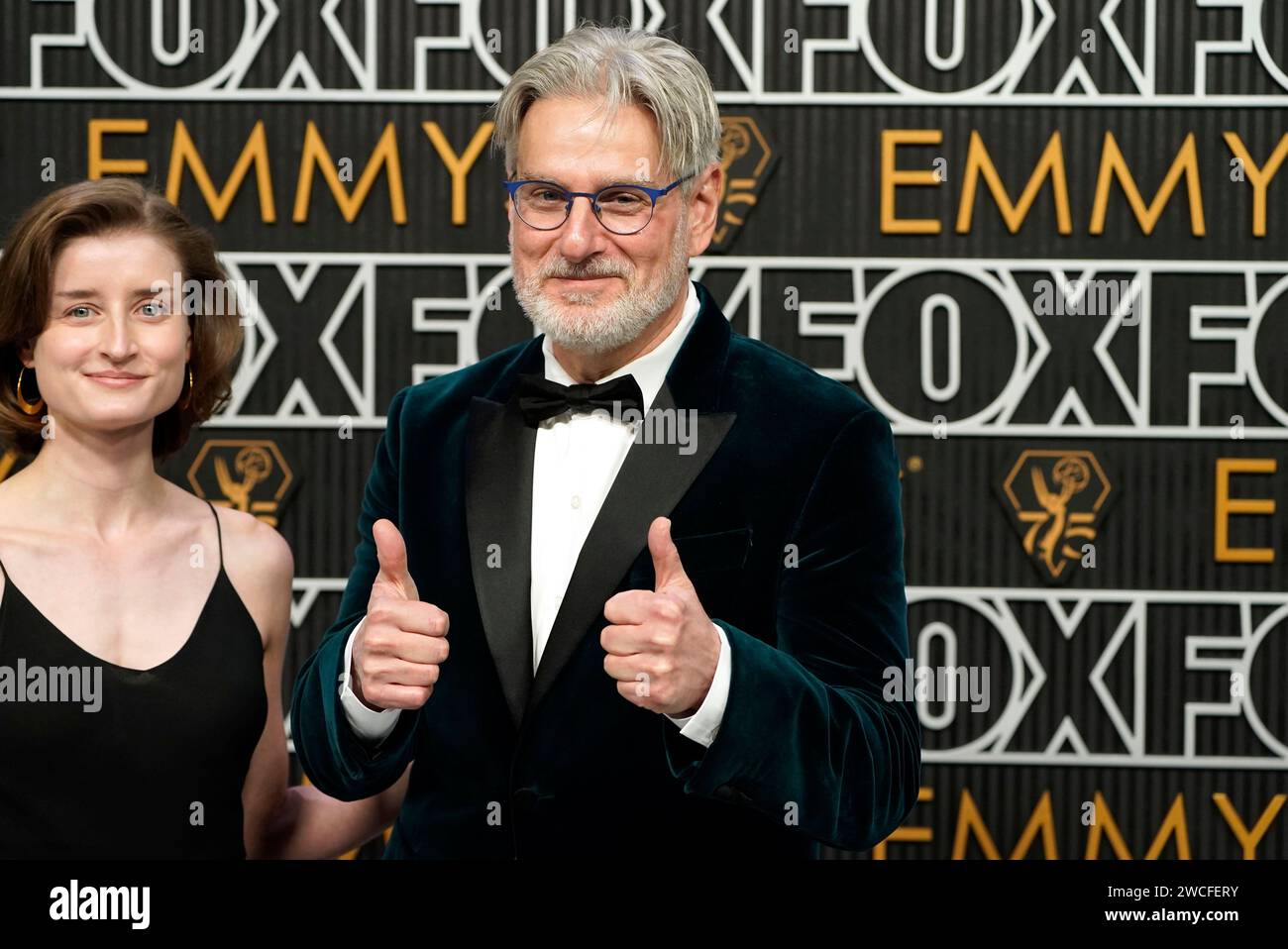 Peter Gould, right and Nora Doyle pose for a Red Carpet portrait at the 75th Emmy Awards on ...