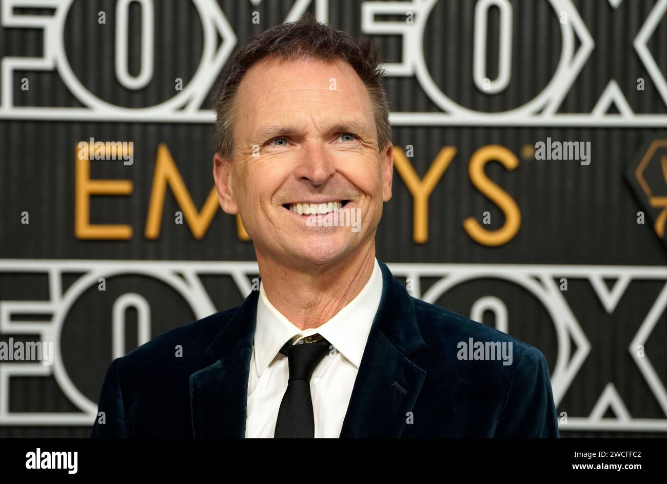 Phil Keoghan poses for a Red Carpet portrait at the 75th Emmy Awards on ...