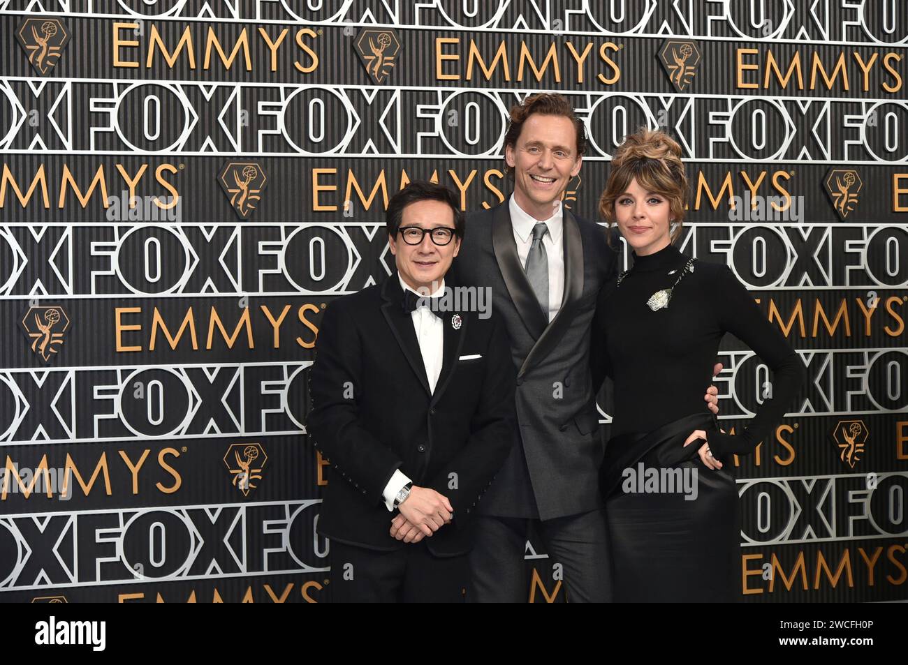 Ke Huy Quan, from left, Tom Hiddleston, and Sophia Di Martino arrive at ...