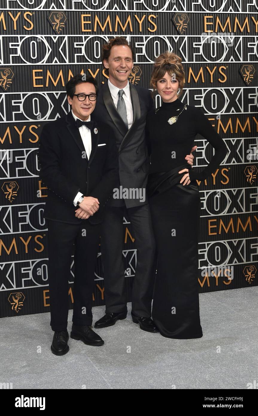 Ke Huy Quan, from left, Tom Hiddleston, and Sophia Di Martino arrive at ...