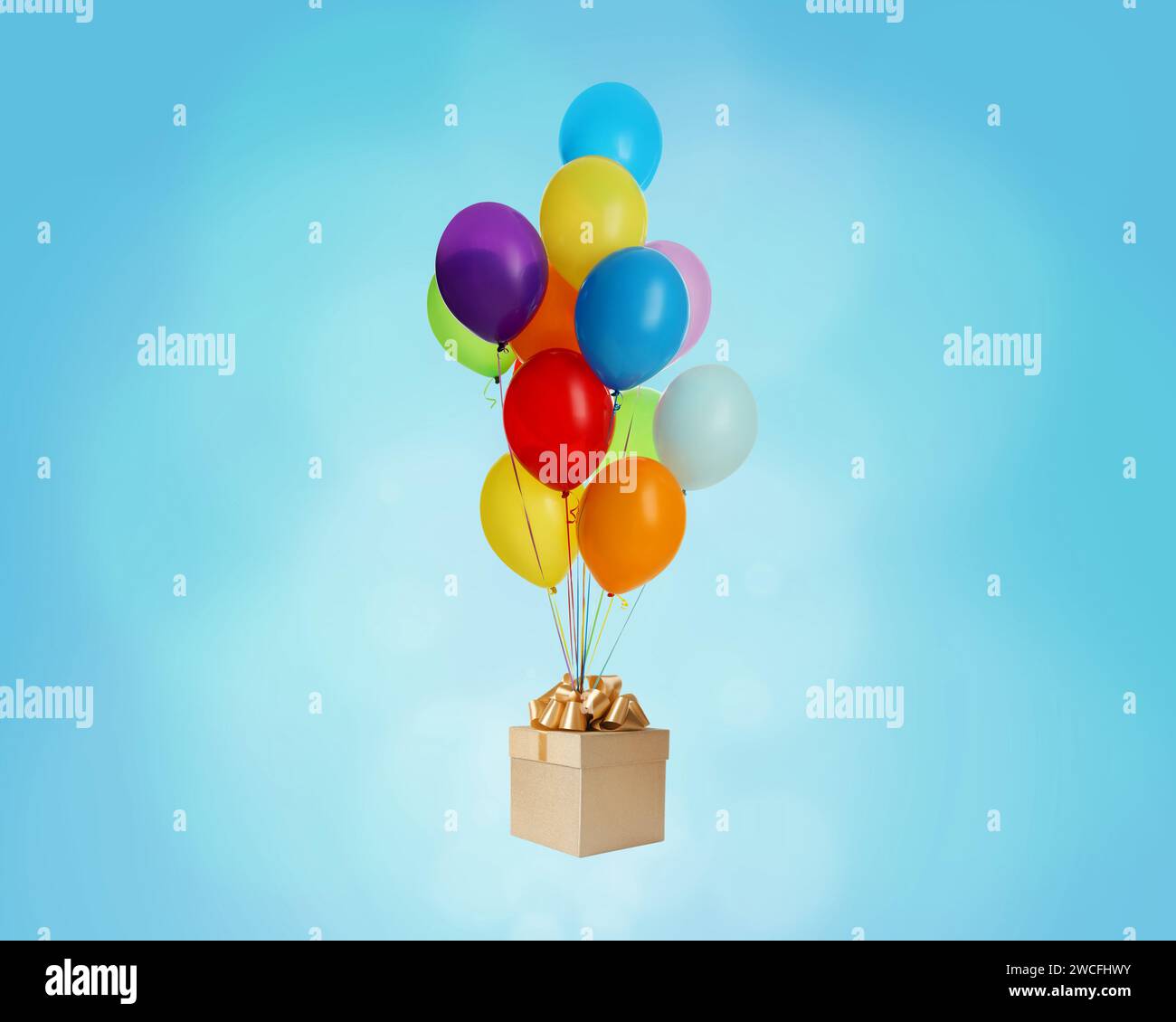 Many balloons tied to gift box on light blue background Stock Photo - Alamy