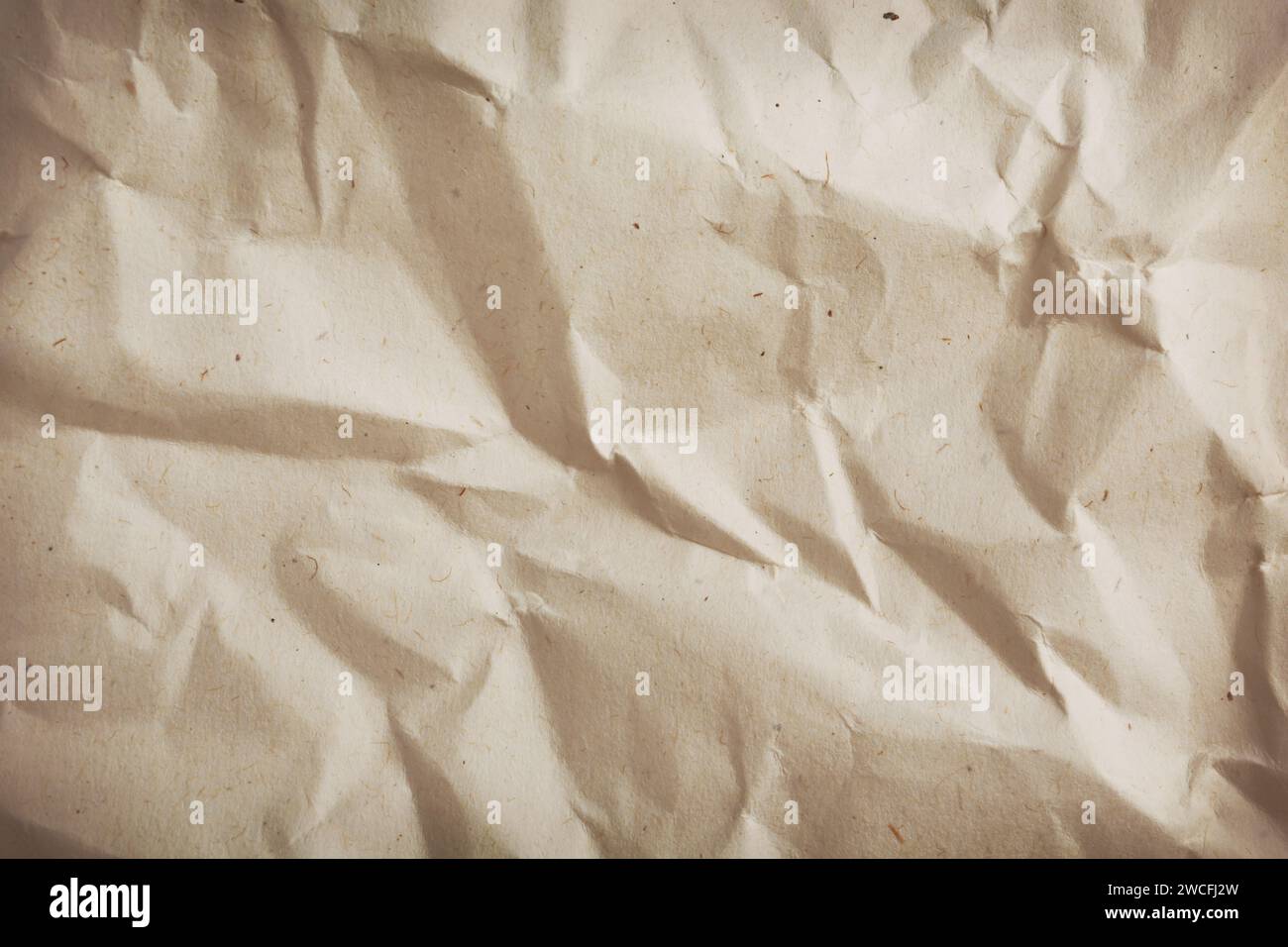 Crumpled old paper as background. Texture of parchment Stock Photo - Alamy