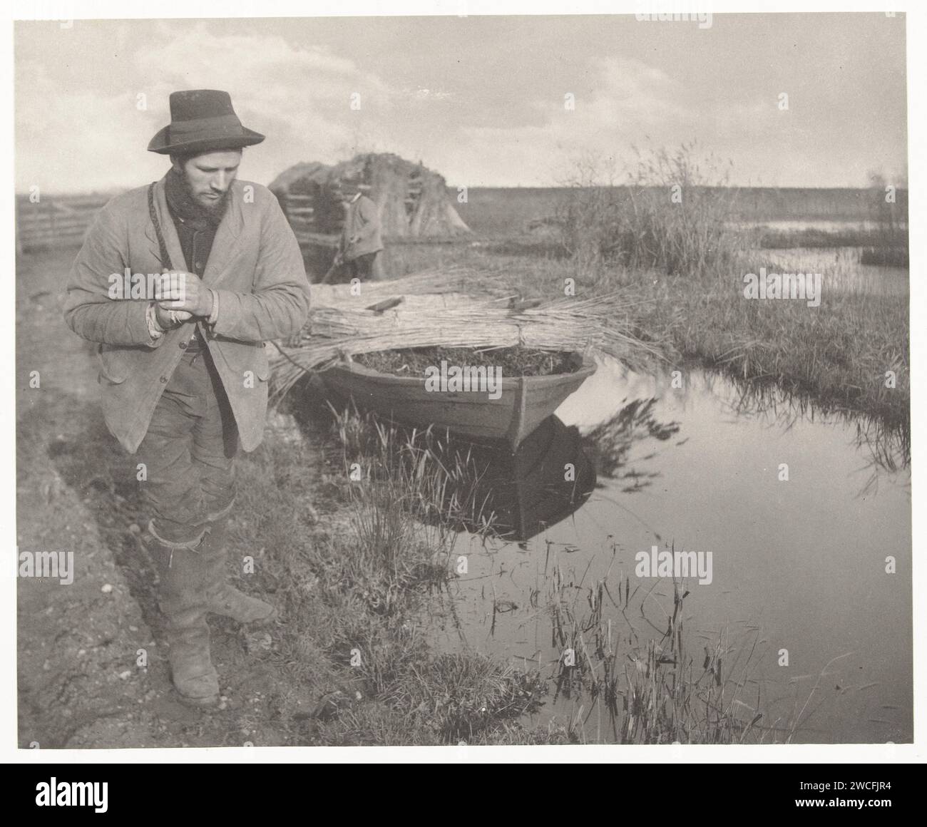 Rowing boat towing canoe hi-res stock photography and images - Alamy