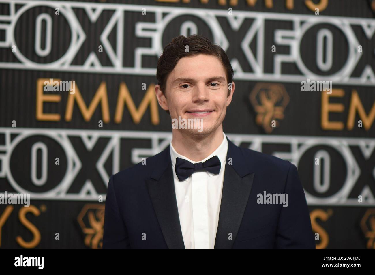Evan Peters arrives at the 75th Primetime Emmy Awards on Monday, Jan ...
