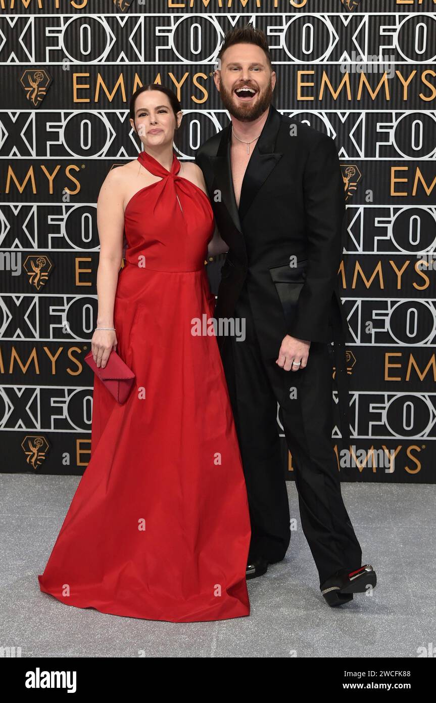 Emily Hampshire, left, and Bobby Berk arrive at the 75th Primetime Emmy ...