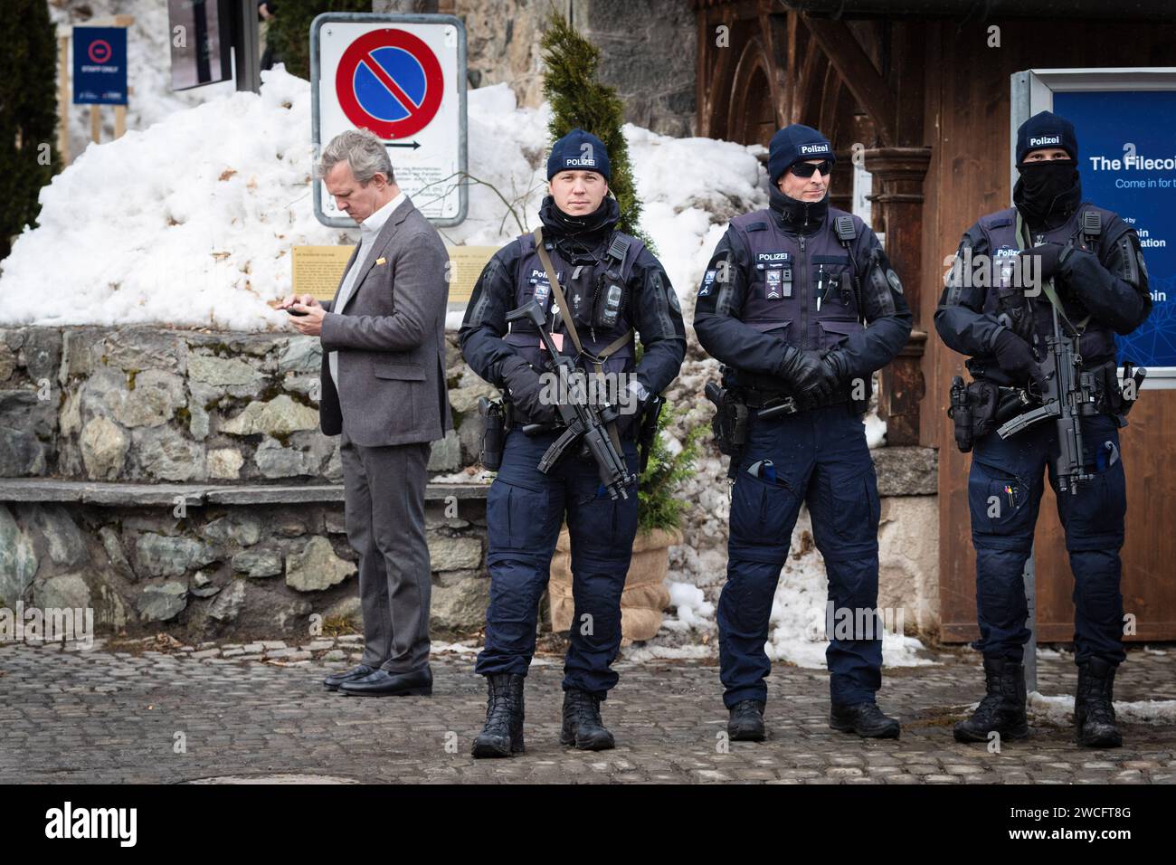 Davos, Switzerland. 15th Jan, 2024. Armed officers stand guard for the ...