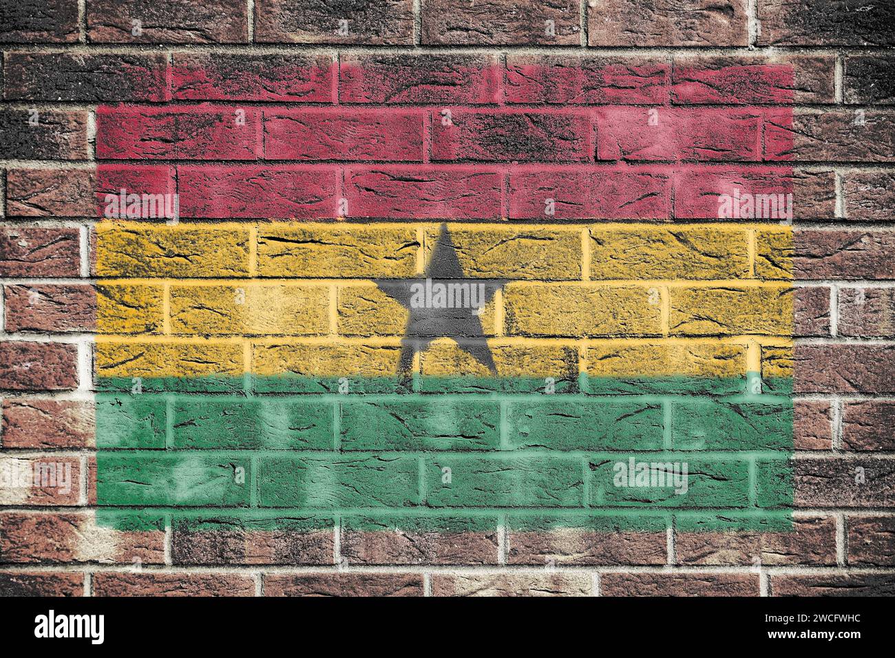 Ghana flag painted on brick wall background Stock Photo - Alamy