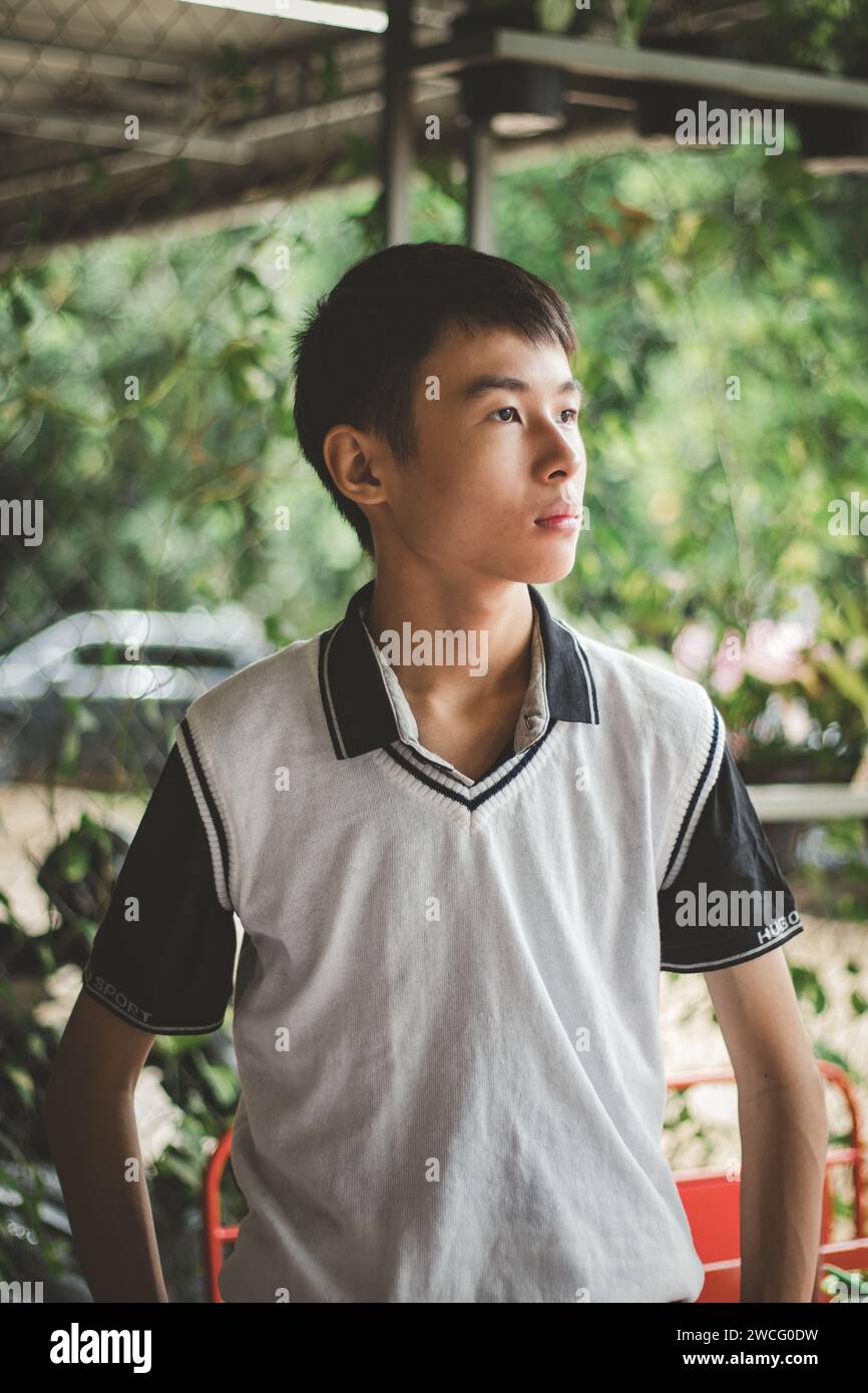 Male Teenager Close-up profile Front view portrait with blurred ...