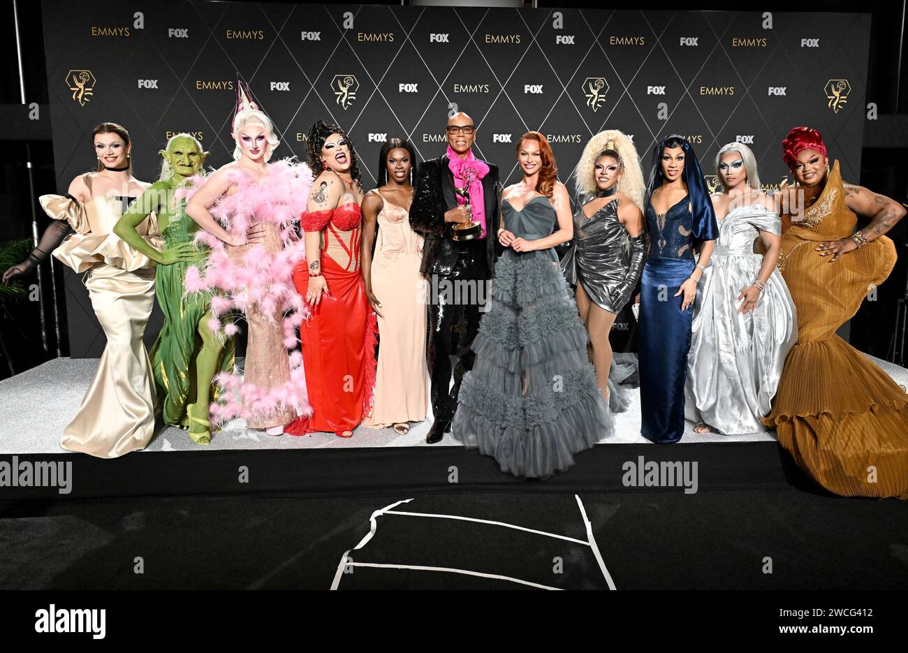 The team from "RuPaul's Drag Race" poses in the pressroom with the Emmy ...