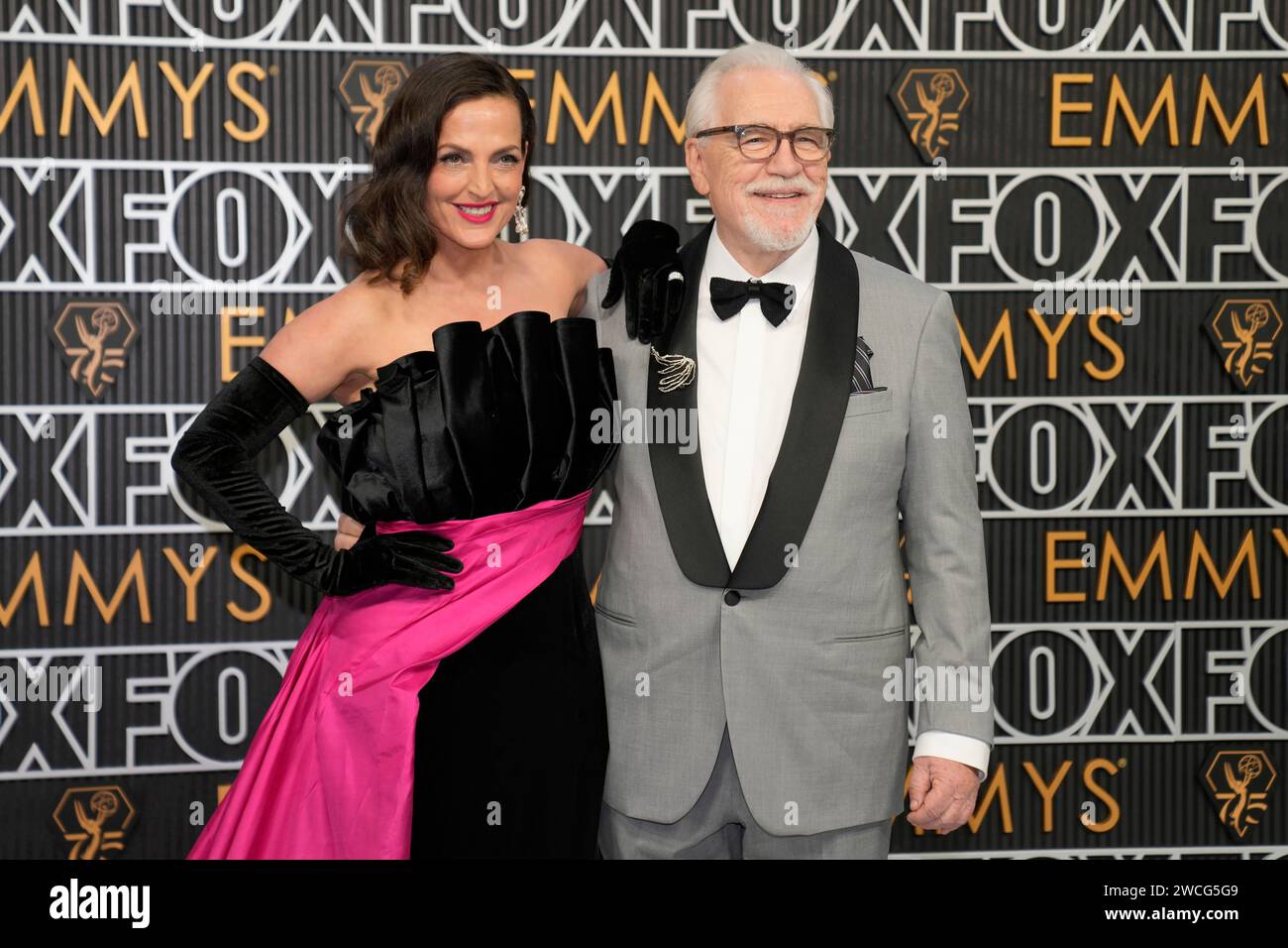 Nicole Ansari-Cox, left, and Brian Cox arrive at the 75th Primetime ...