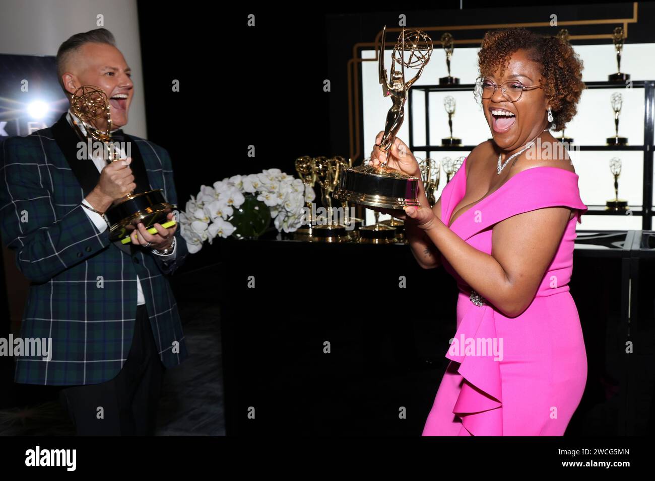 Ross Mathews, left, and Ashlei Dabney pick up their official Emmy ...