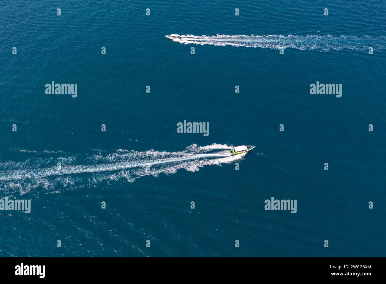 Two traffic flow of speedboats in the strait between tropical exotic ...